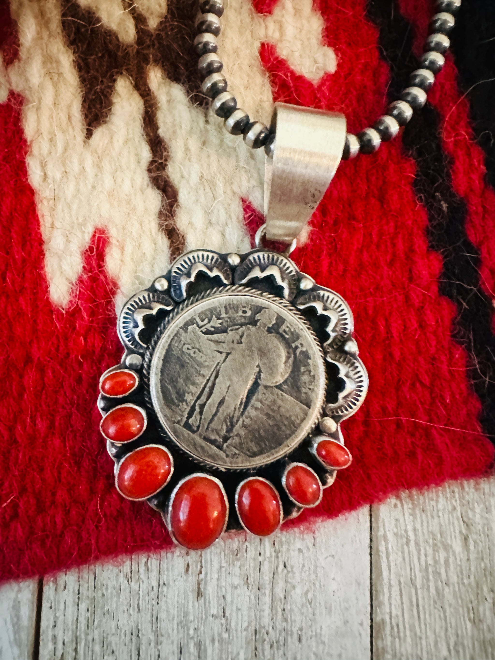 Handcrafted Sterling Silver and Coral Liberty Coin Pendant by Randy Bo
